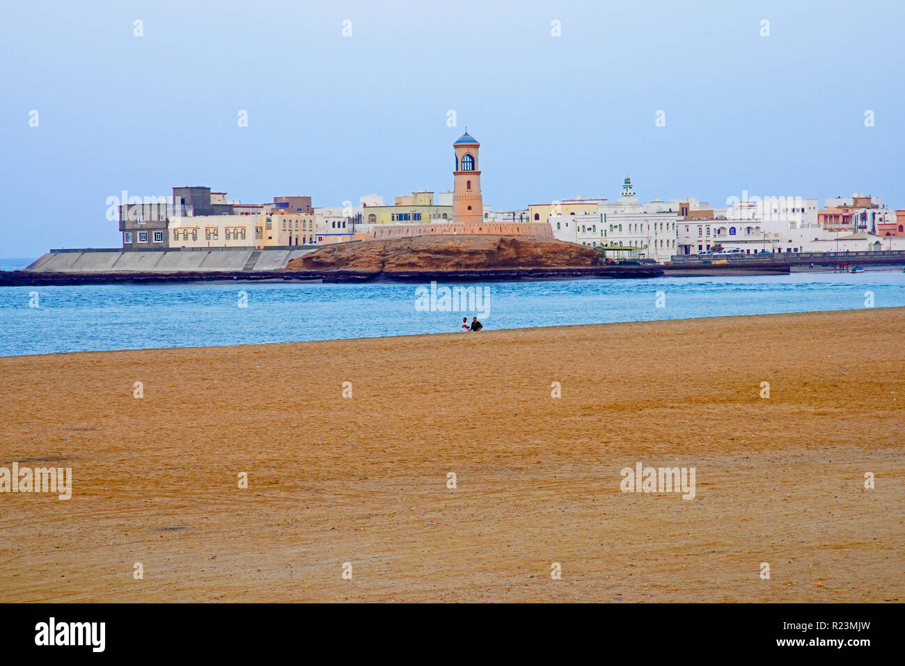 View of Al Ayjah town, lighthouse in the bay of Sur, Oman Stock Photo ...