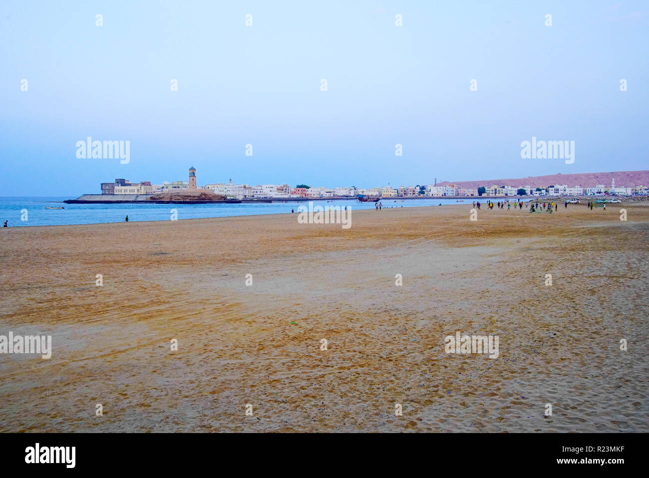 View of Al Ayjah town, lighthouse in the bay of Sur, Oman Stock Photo ...