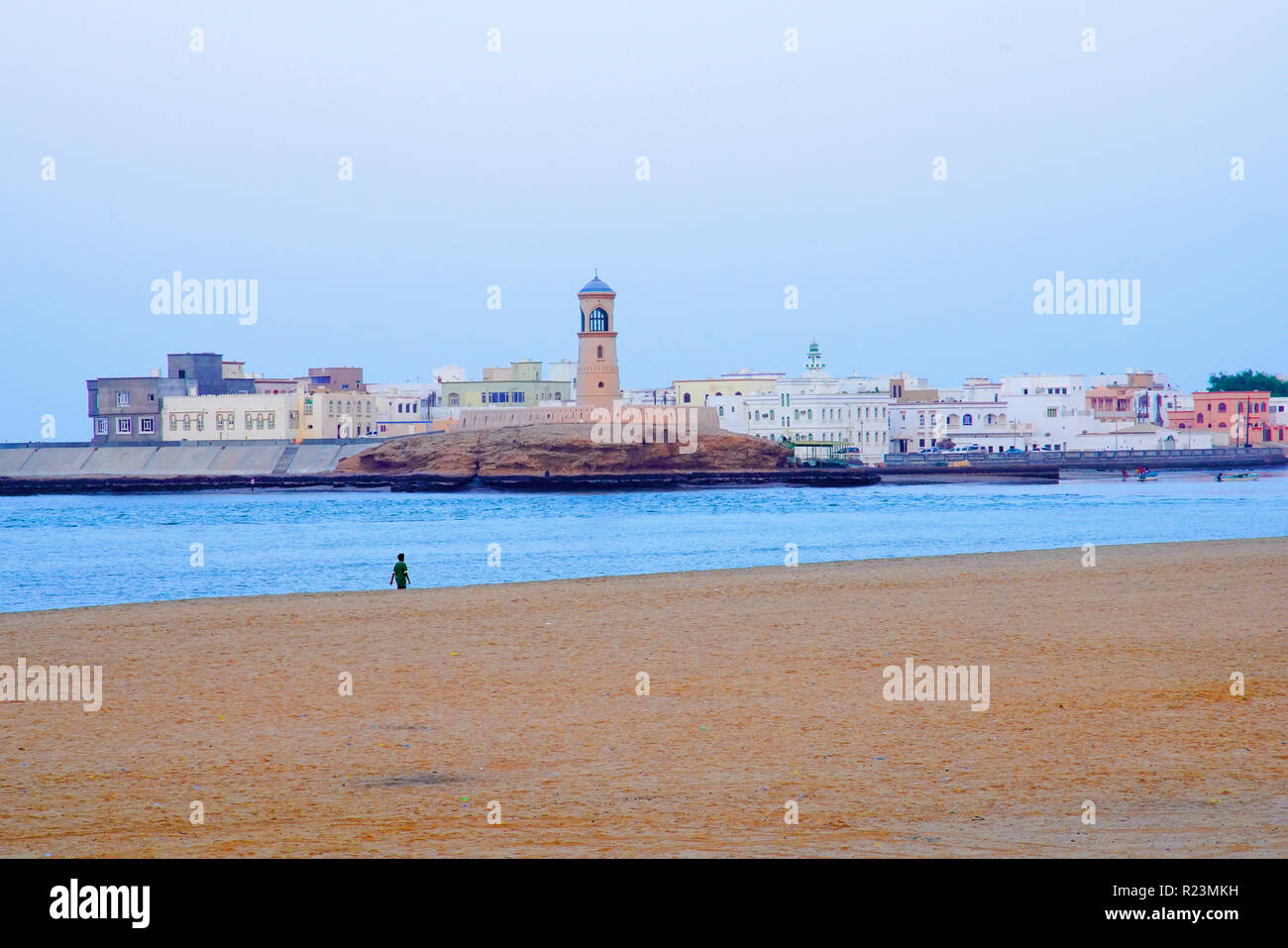 View of Al Ayjah town, lighthouse in the bay of Sur, Oman Stock Photo ...