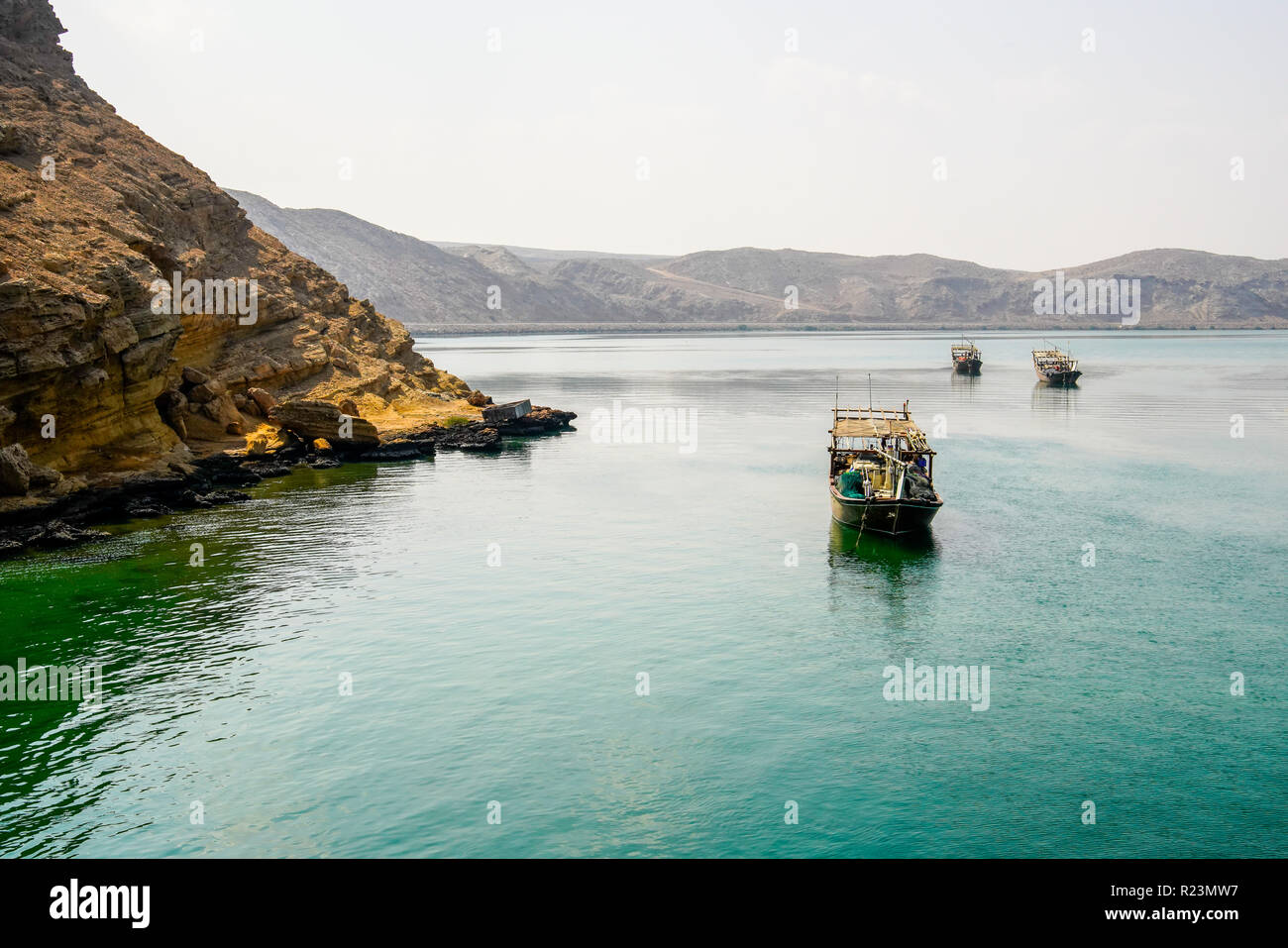 Sur town, old traditional omani wooden boat (dhow) in the harbor ...