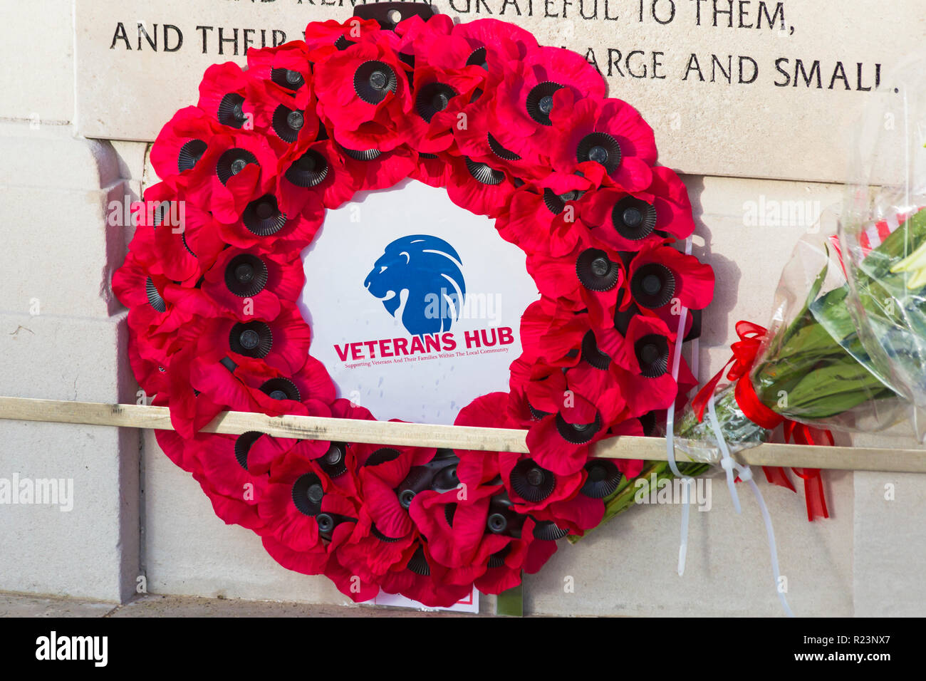 poppy wreath laid on Remembrance Day at Weymouth, Dorset UK in November ...