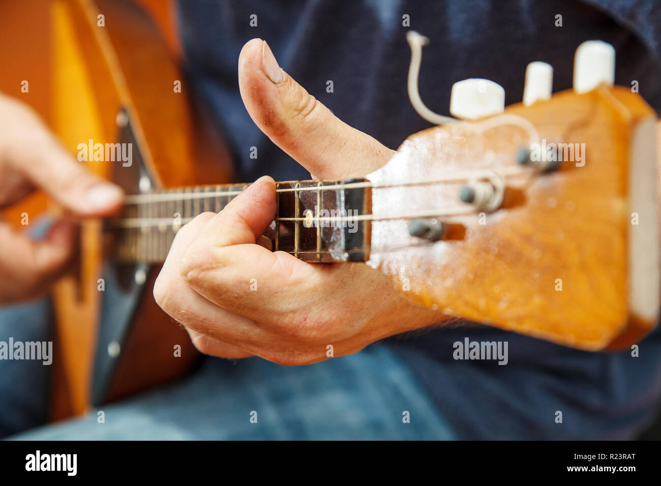 Balalaika playing hi-res stock photography and images - Alamy