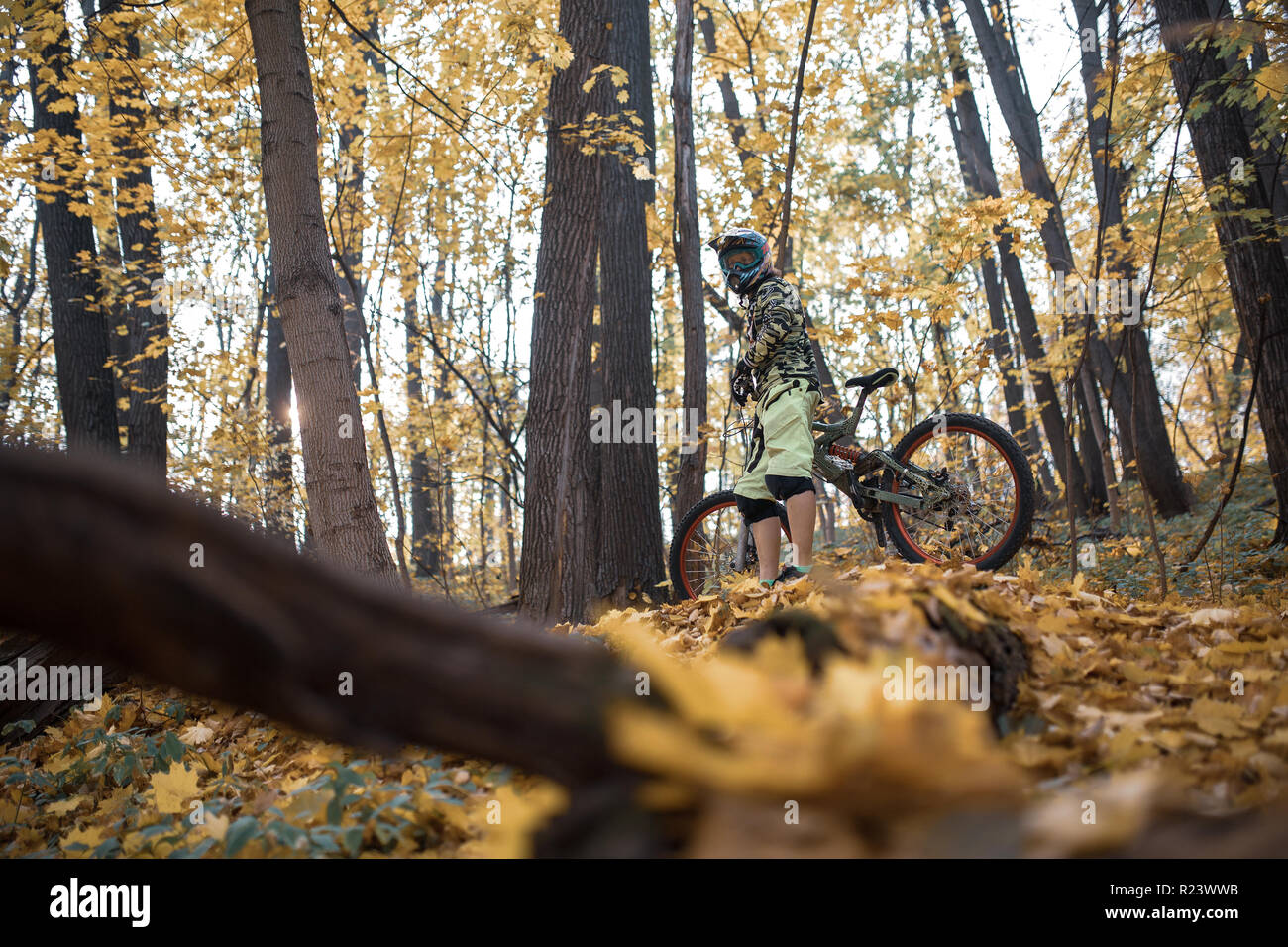 Image of athlete riding sports bike on track Stock Photo - Alamy