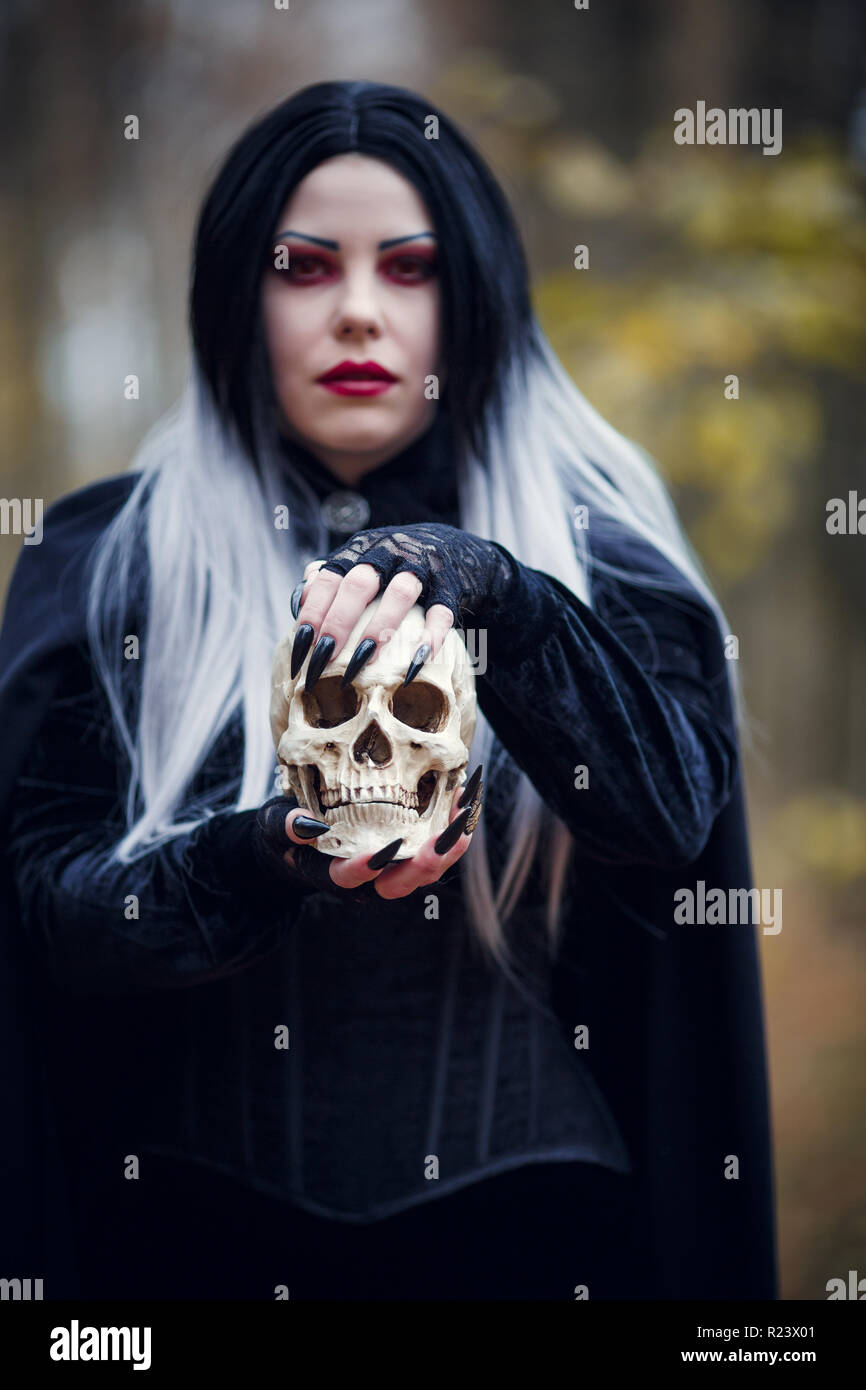 Black cloak hi-res stock photography and images - Alamy