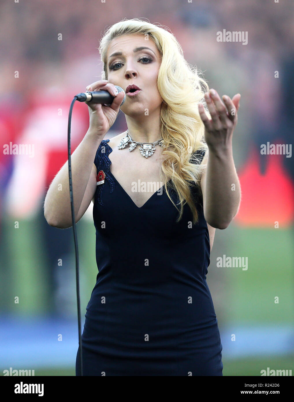 Soprano Emily Haig sings the New Zealand national anthem prior to kick ...