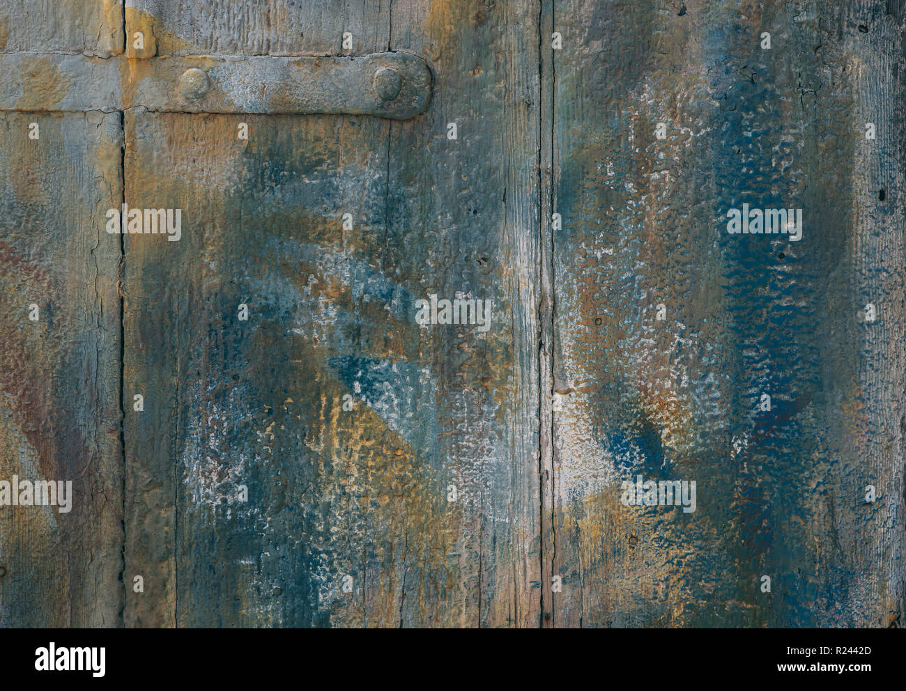 Old door with different paint, use as natural background Stock Photo ...