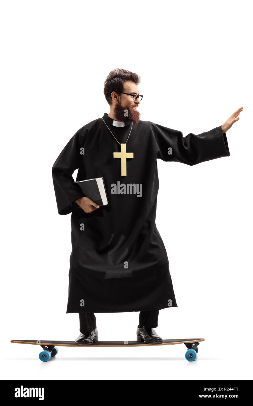 Full length shot of a priest riding a longboard isolated on white ...
