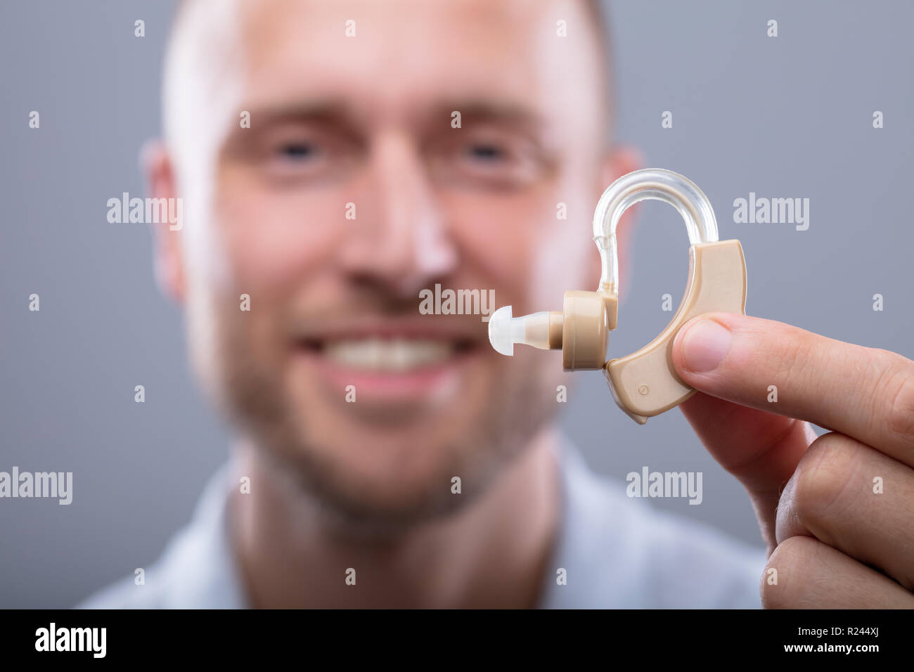 Hearing aid happy hi-res stock photography and images - Alamy