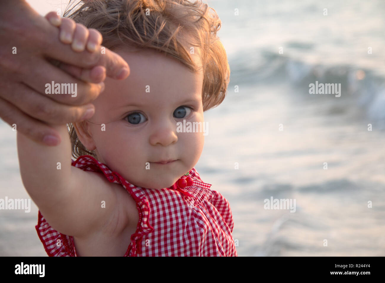 Baby in fathers hand hi-res stock photography and images - Alamy