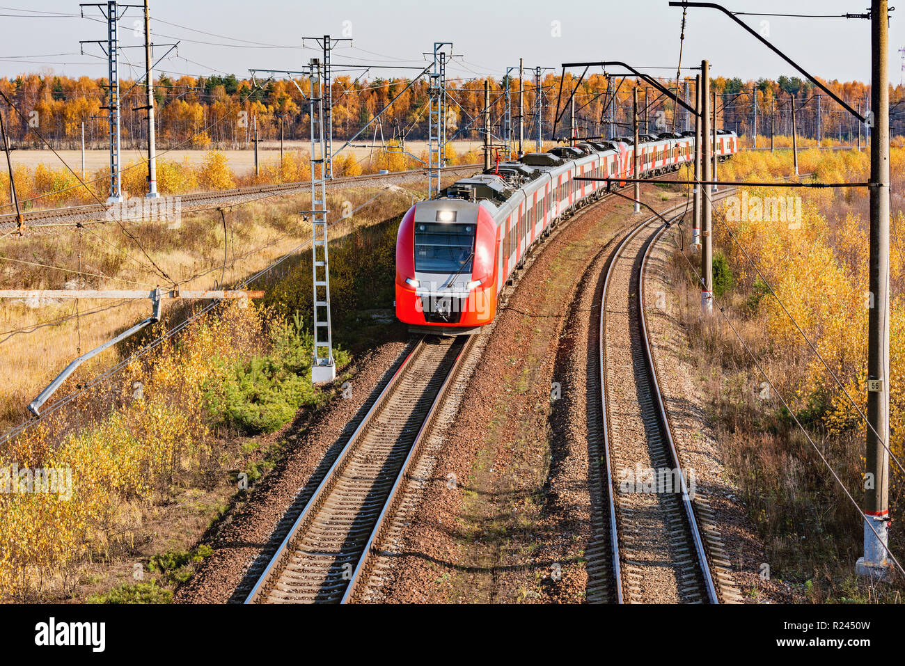 Motion of the modern high-speed train at autumn morning time Stock ...