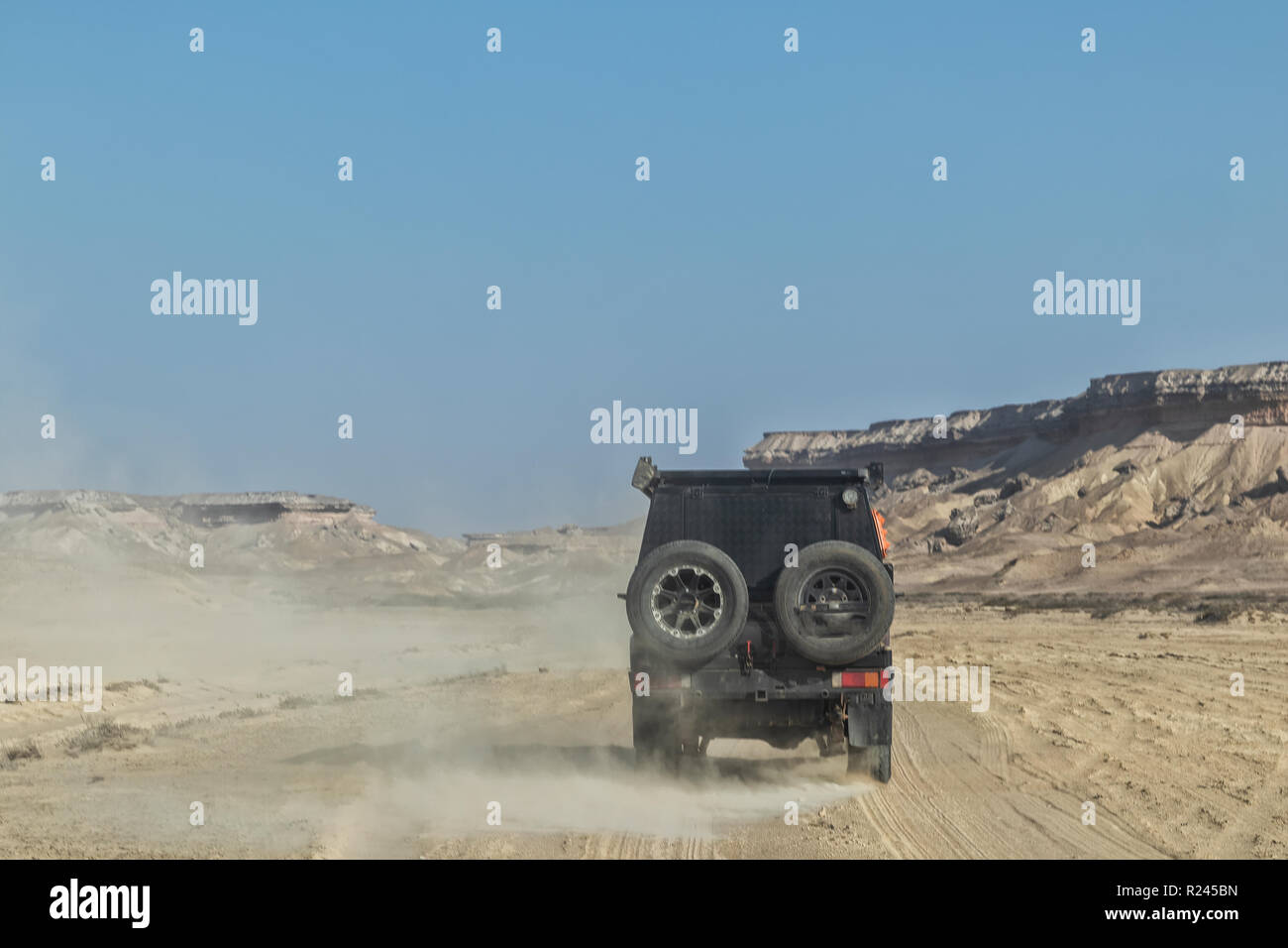 4x4 car on sand road in the canyons of the Namibe Desert. Africa ...
