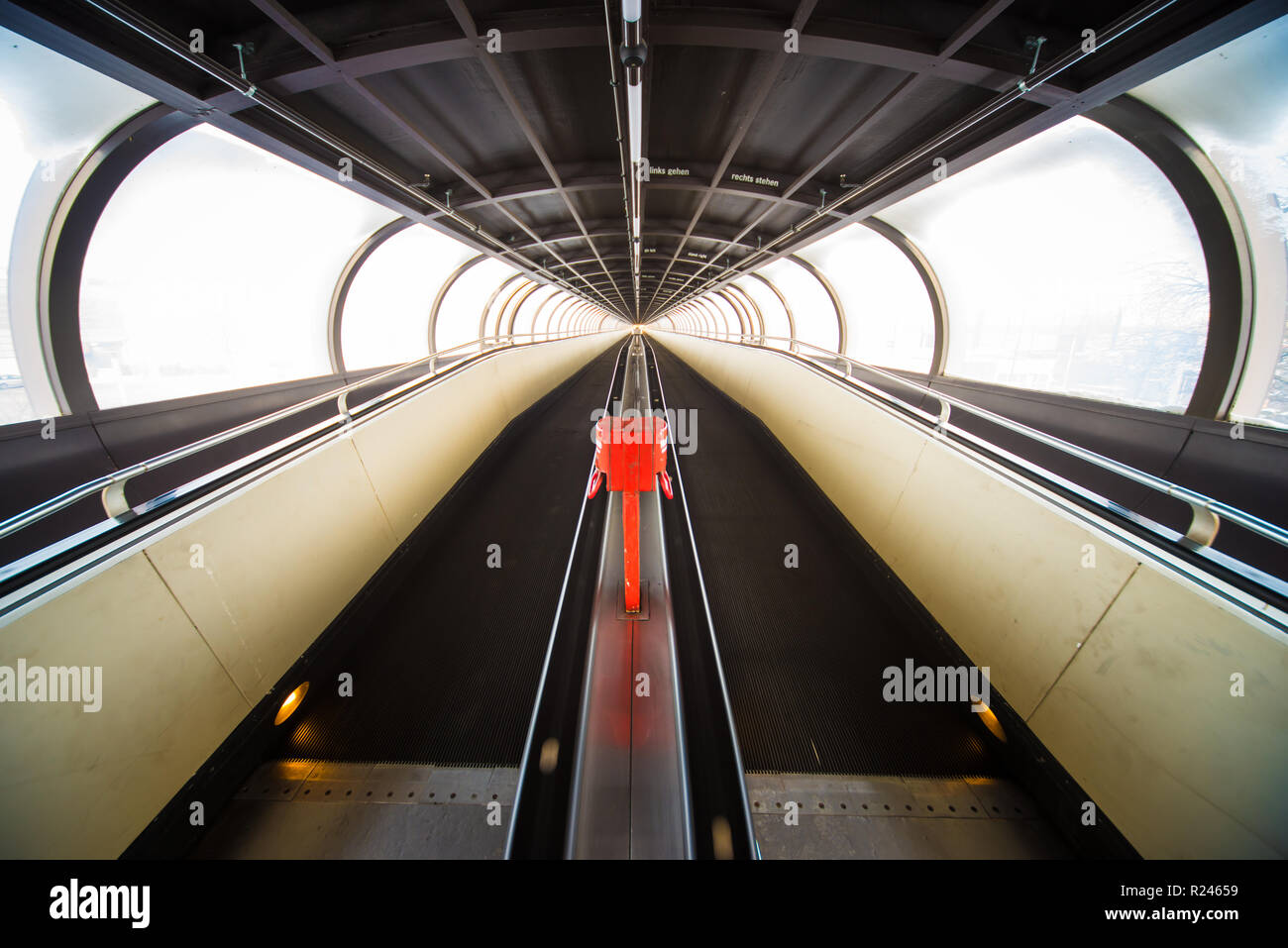 Travelator moving walkway tunnel dynamic perspective, fair Messe ...