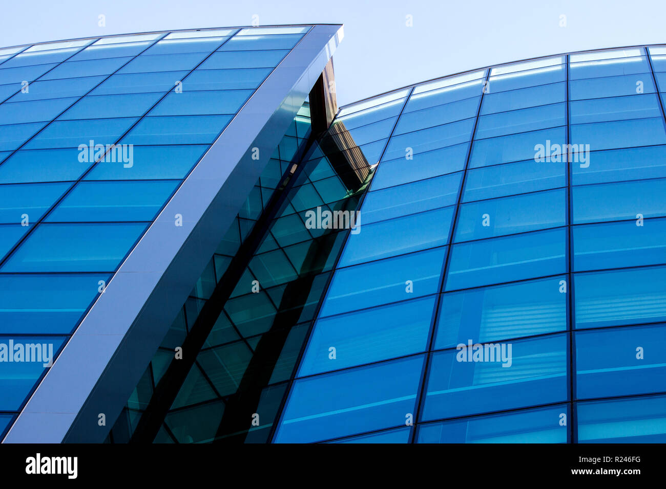 Modern straight and curved architectural lines of the facade of a ...