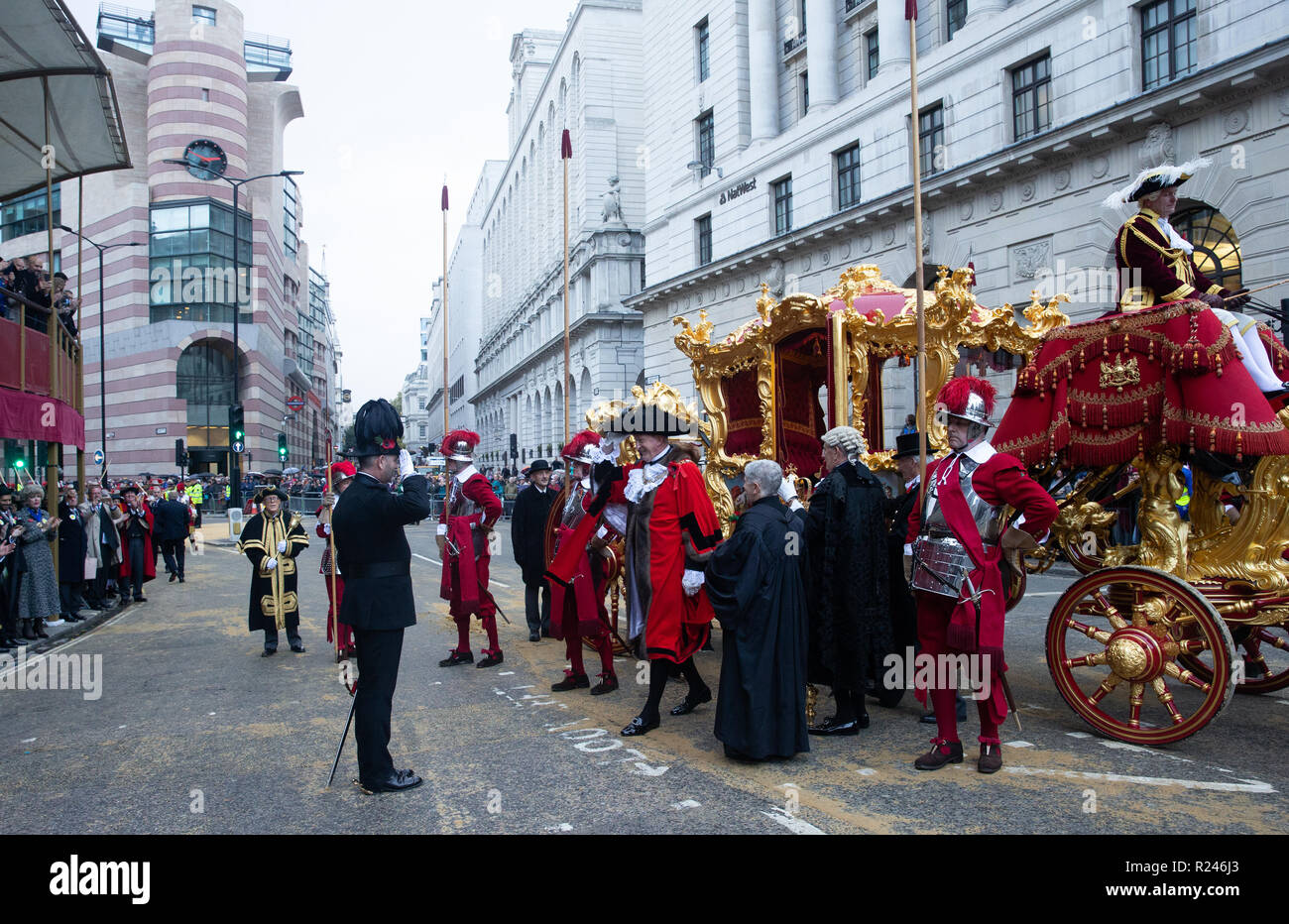 The New Lord Mayor, Peter Estlin, waves from his gold carriage as the ...