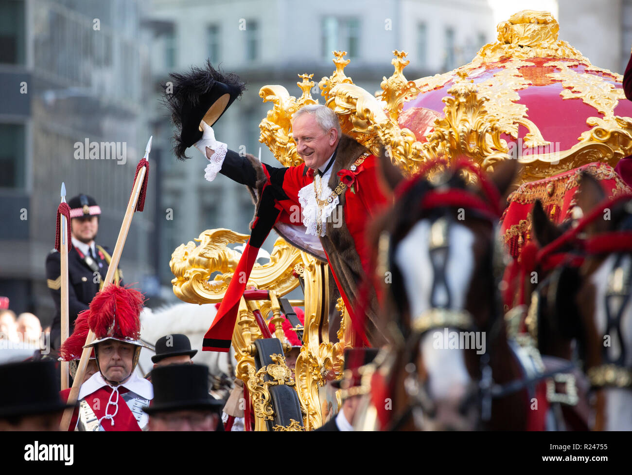 The New Lord Mayor, Peter Estlin, leans out of the Gold coach and waves ...
