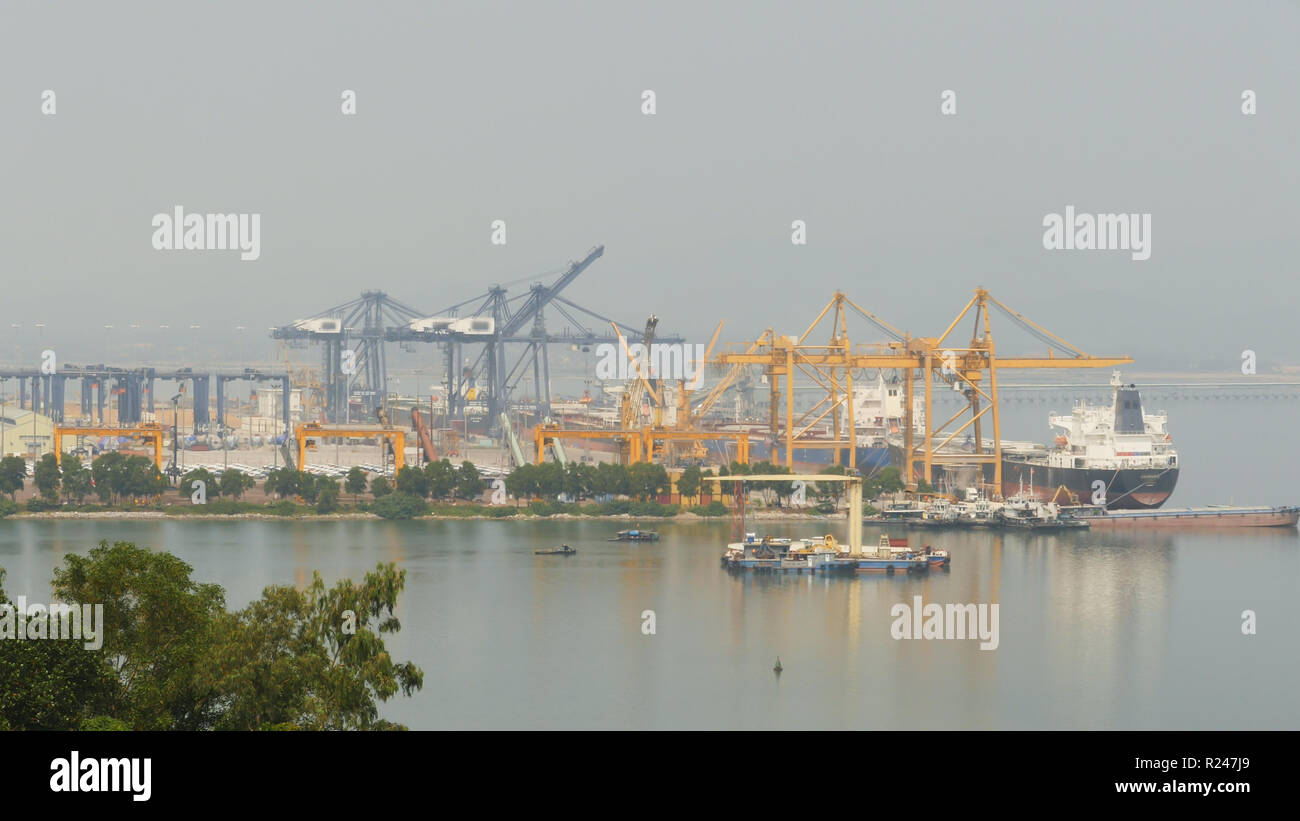 Cargo port in the work. Ha Long Bay. Vietnam Stock Photo - Alamy