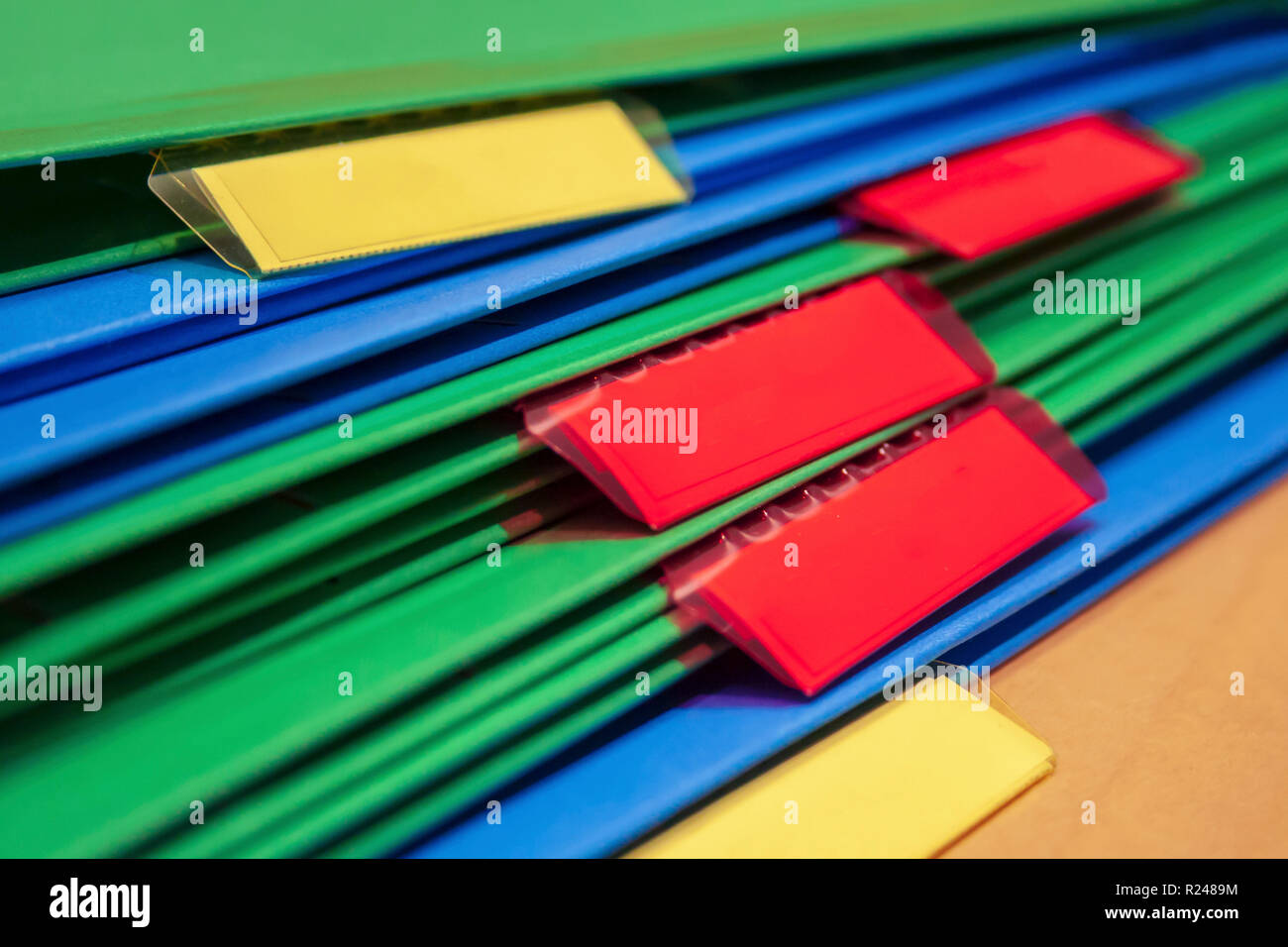 Colorful folders with labels Stock Photo - Alamy