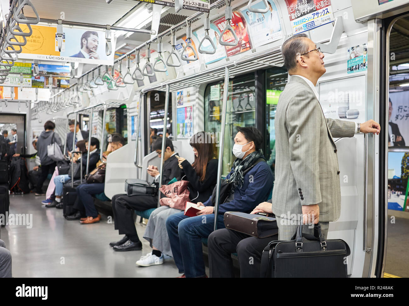 Passengers on a Tokyo subway train, Tokyo, Japan, Asia Stock Photo - Alamy