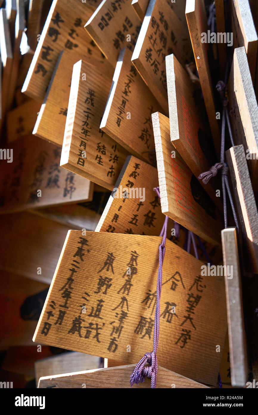 Votives (Ema prayer tablets), with prayers and wishes for success at ...