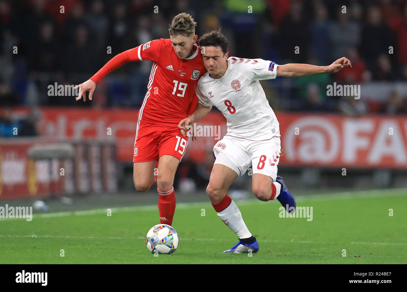 Wales' David Brooks (left) and Denmark's Thomas Delaney battle for the ...