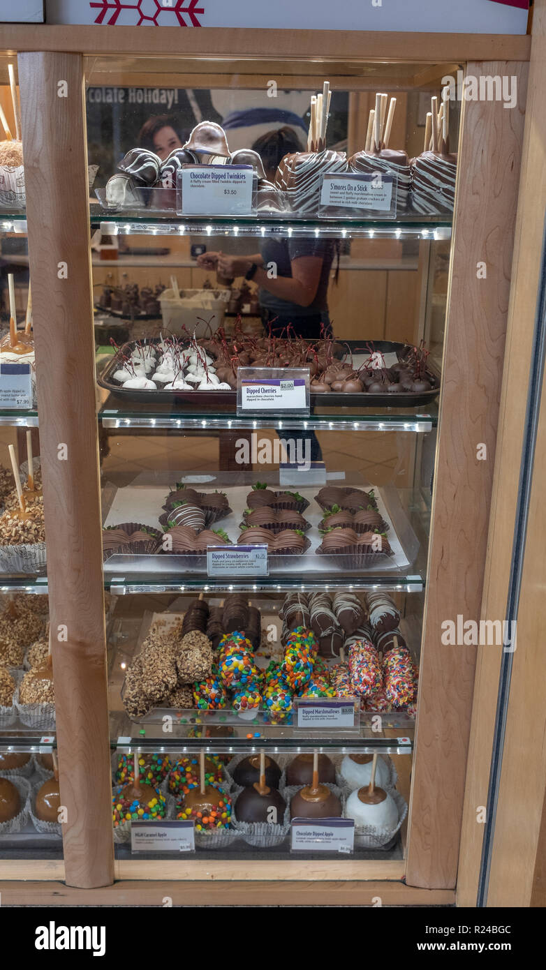 window display of candy apples and other confectioneries Stock Photo ...