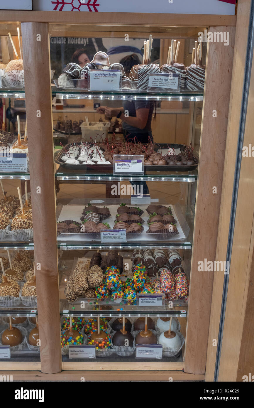 window display of candy apples and other confectioneries Stock Photo ...