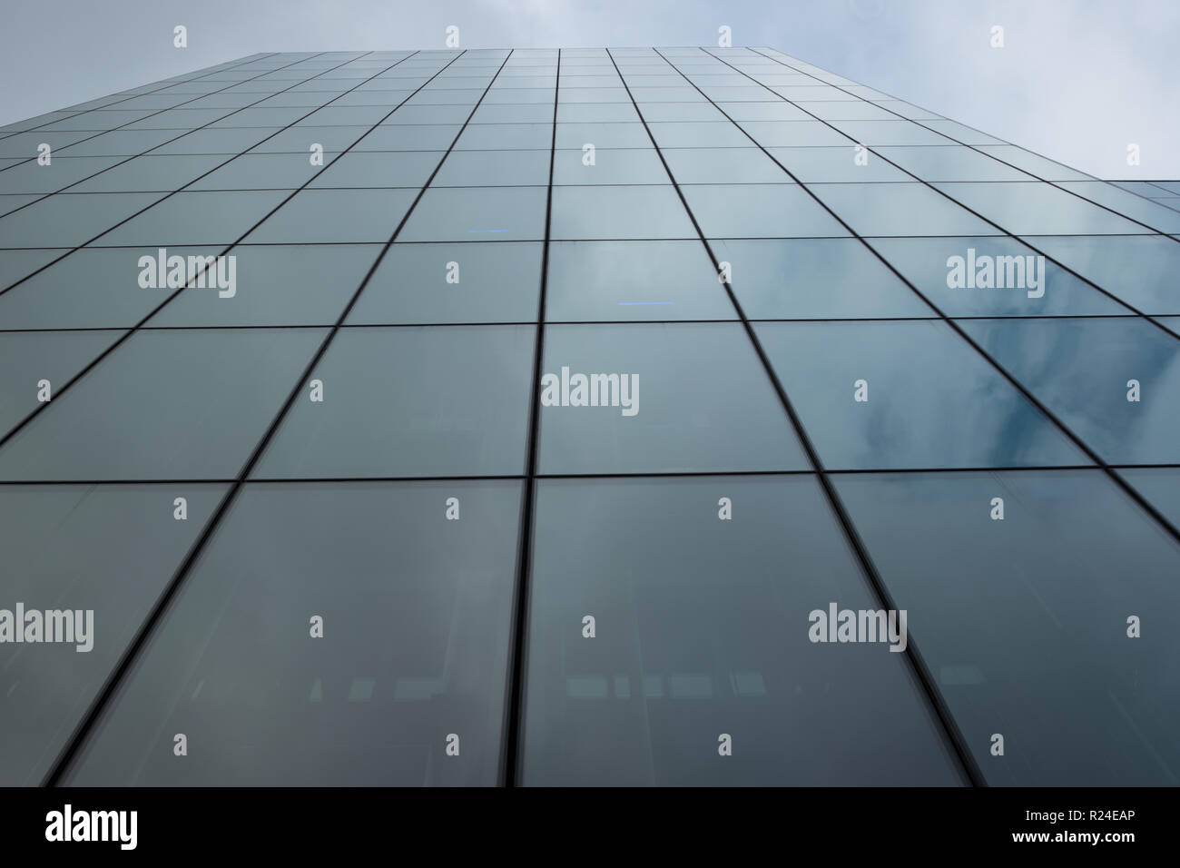 Office block with a wall of windows Stock Photo - Alamy