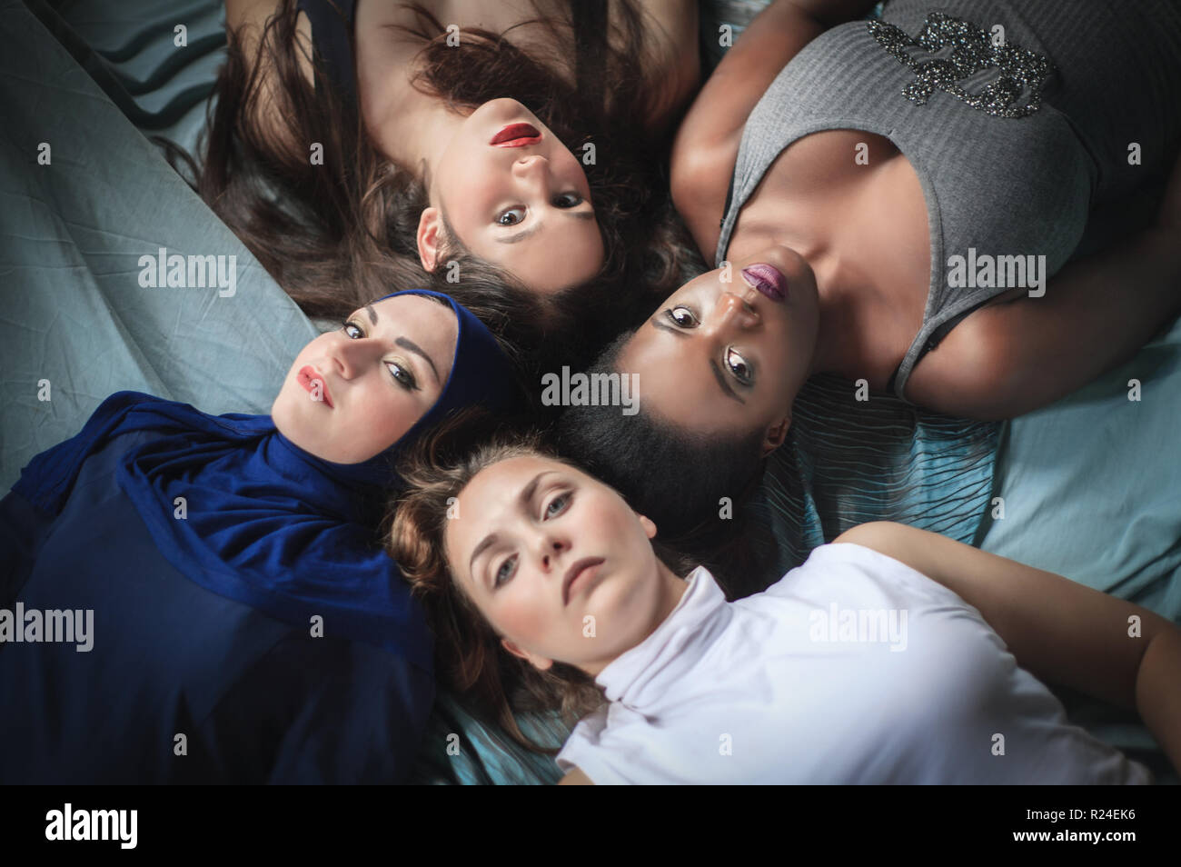 Portrait of four girls with different skin color and nationality in the ...