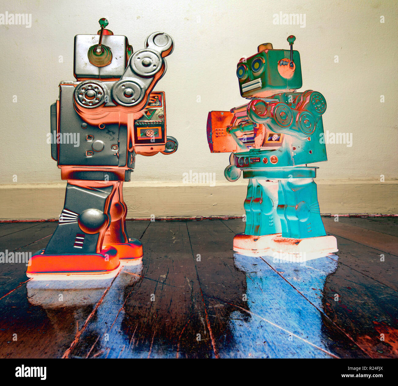 fight club robot concept on a wooden floor Stock Photo - Alamy