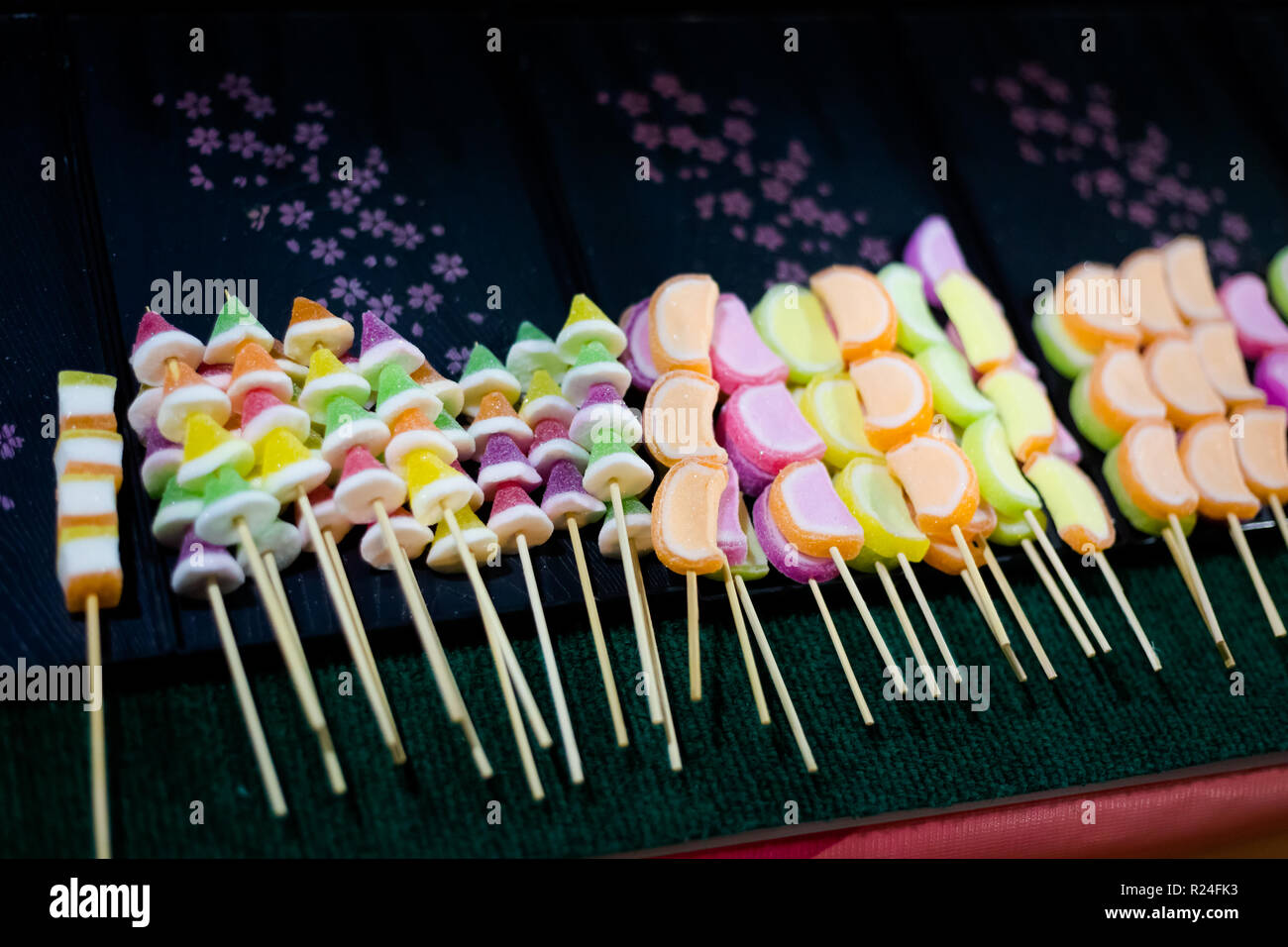 Fresh asian sugar coated colorful jelly sticks on local market in Krabi ...
