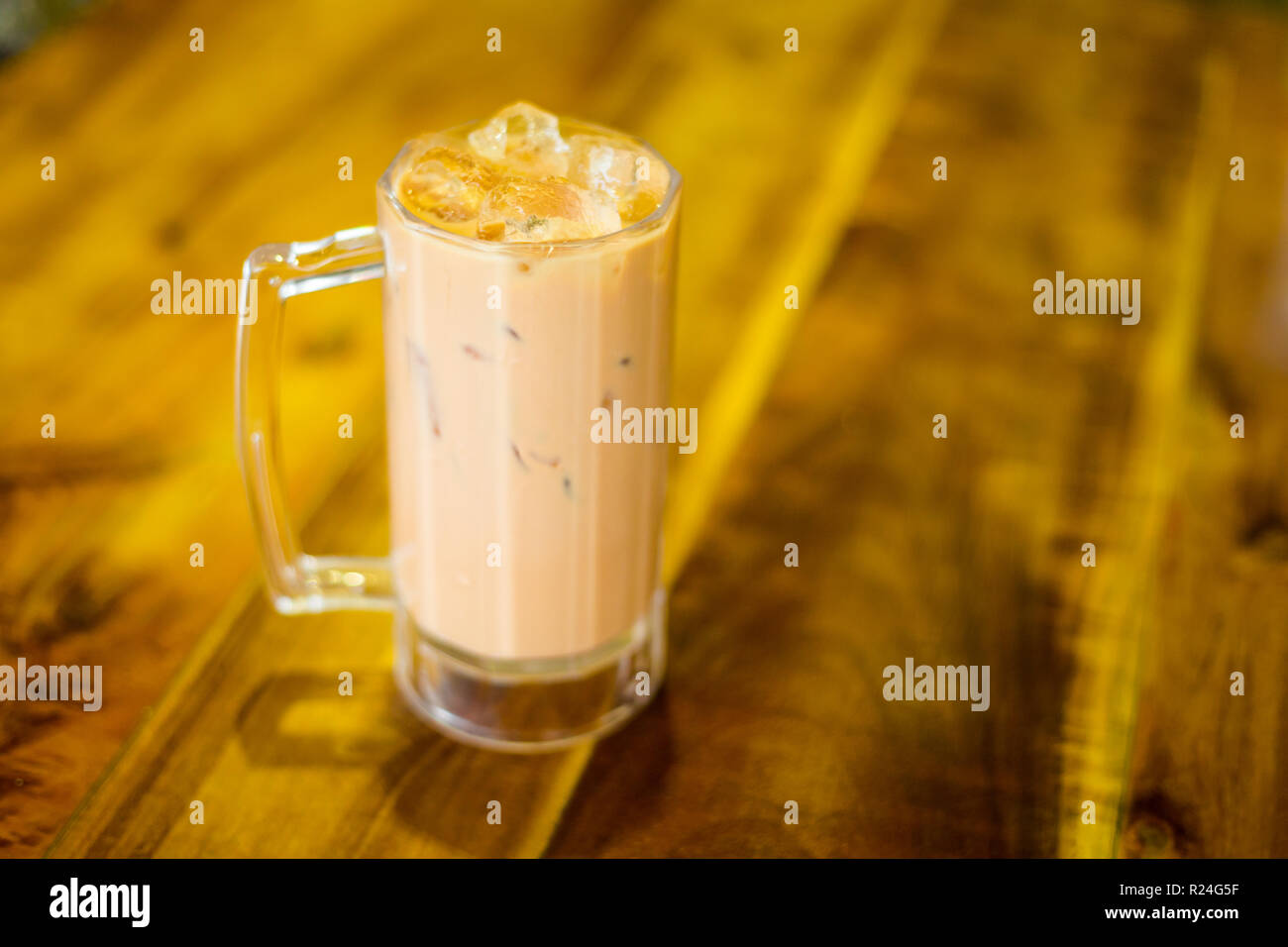 Fresh prepared malaysian Teh Tarik sweet pulled ice milk tea in local ...