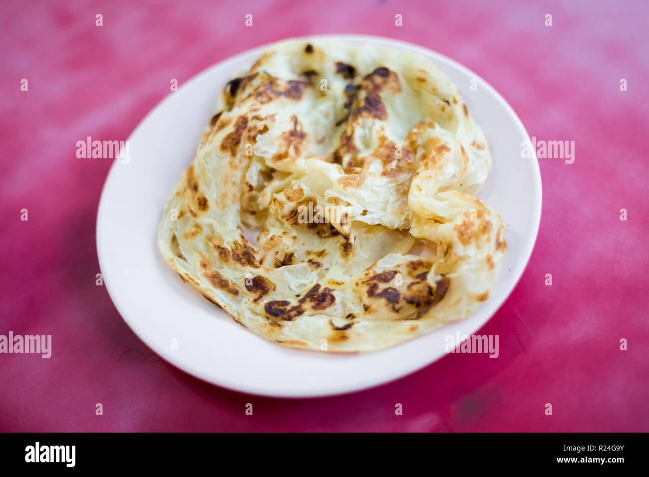 Fresh prepared malaysian roti wheat indian pancake served in local ...