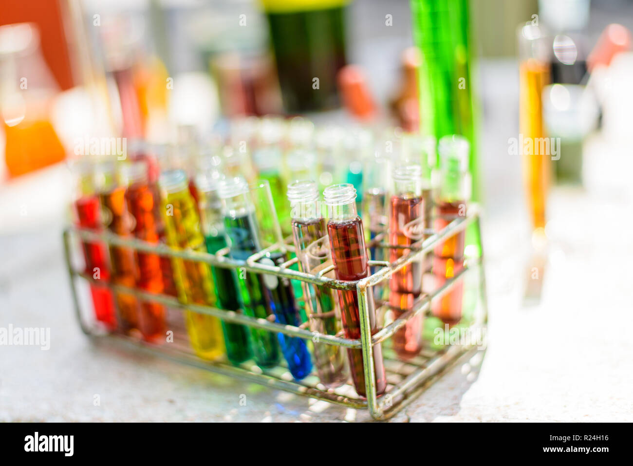 Colorful water in test tube in lab Stock Photo - Alamy