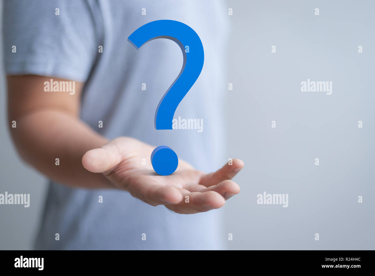 human hand present 3d rendering blue question mark Stock Photo - Alamy