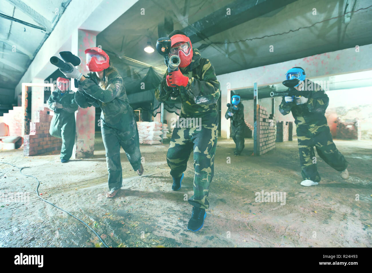 Teams are face to face on the paintball ground Stock Photo - Alamy