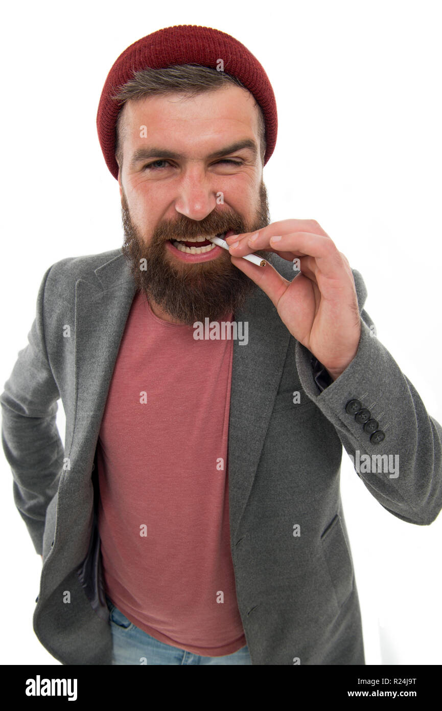 Brutal habits and lifestyle. Hipster brutal bearded tobacco smoker ...