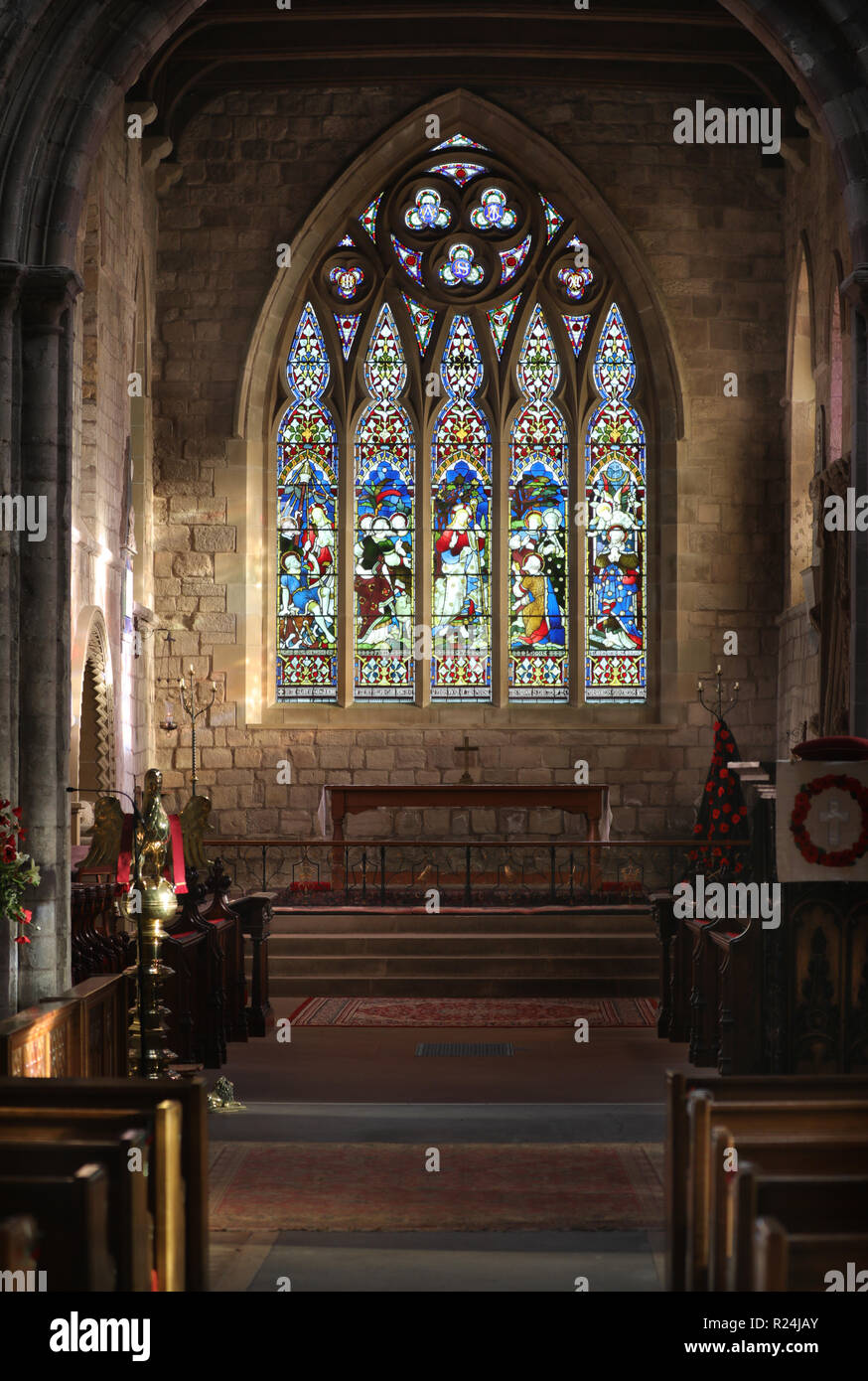 Stained glass window of Norham Church viewed from the Nave Stock Photo ...