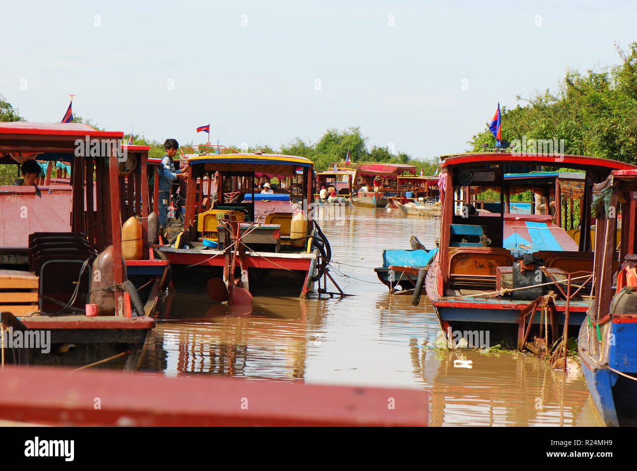 The Floating Village of Tonle Sap Lake and Boat guide Stock Photo - Alamy