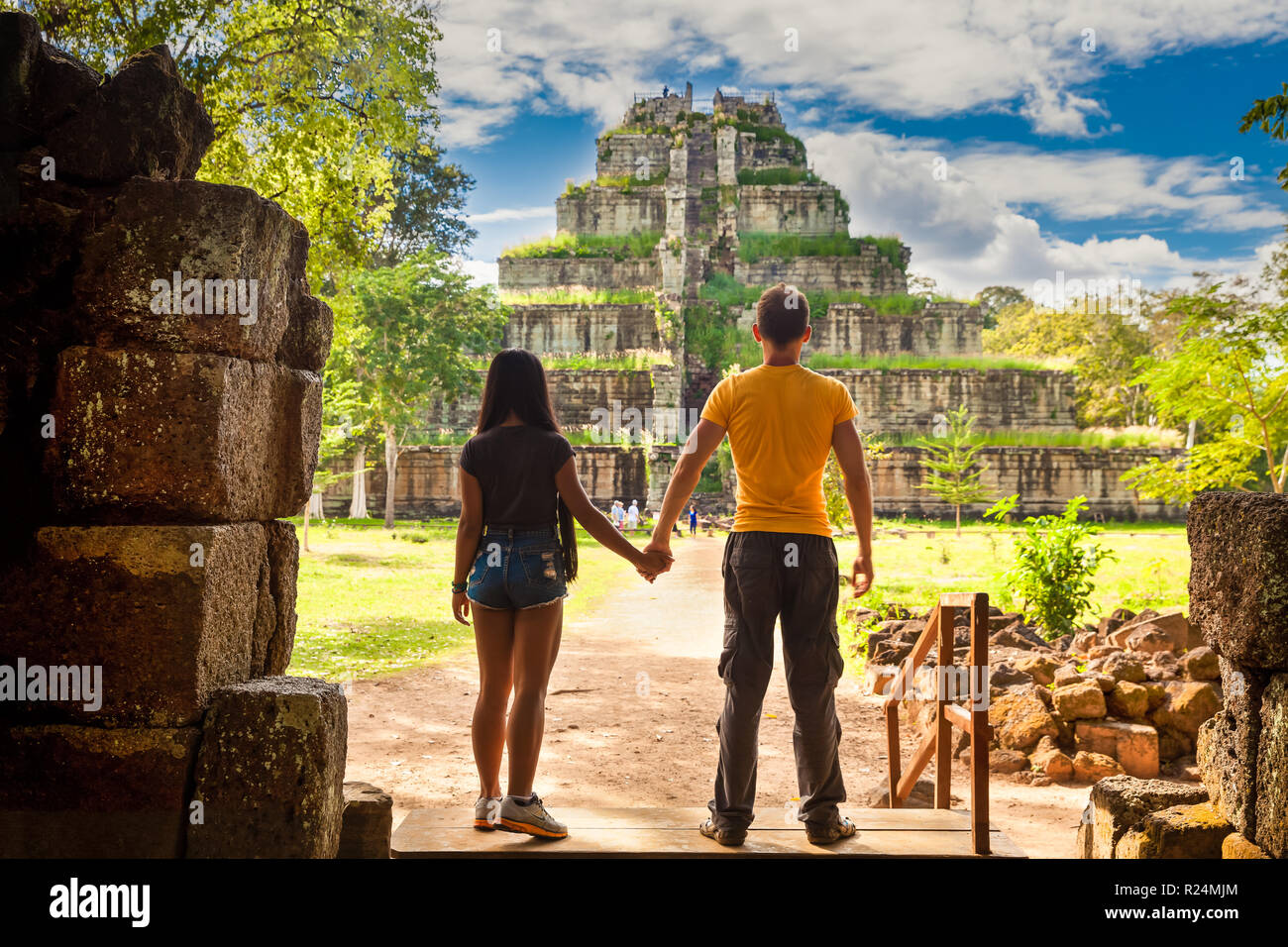 Travel couple tourist explore ancient mysterious pyramid death Prasat ...