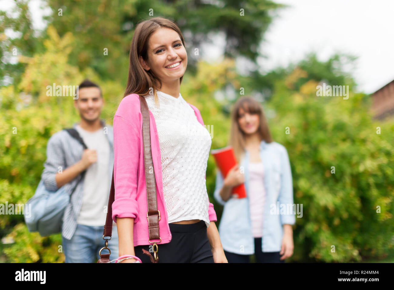 Group of smiling students Stock Photo - Alamy