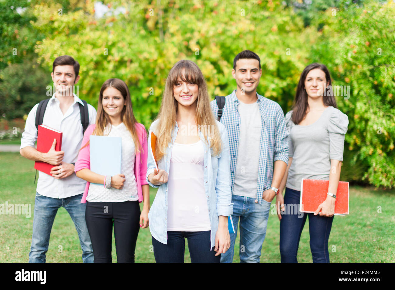 Group of smiling students Stock Photo - Alamy