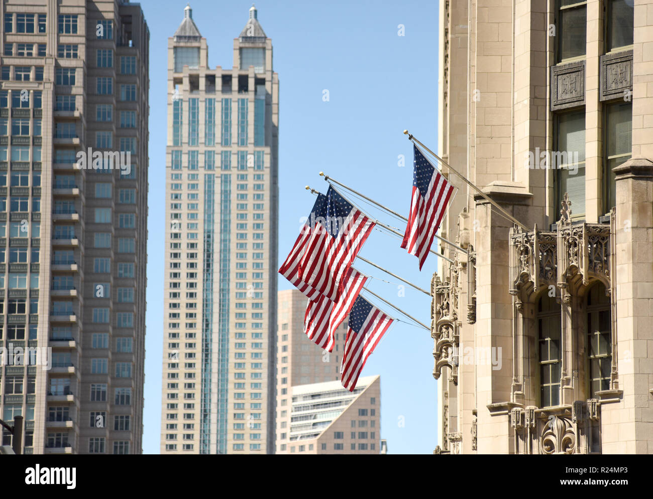American flag on a building in downtown of Chicago Stock Photo - Alamy