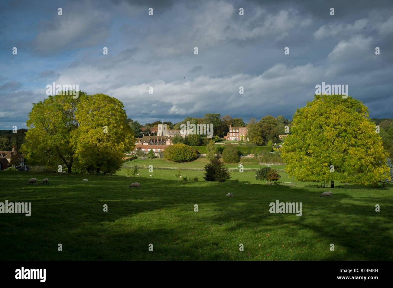 The beautiful village of Ewelme, Oxfordshire, in the Autumn sun with ...