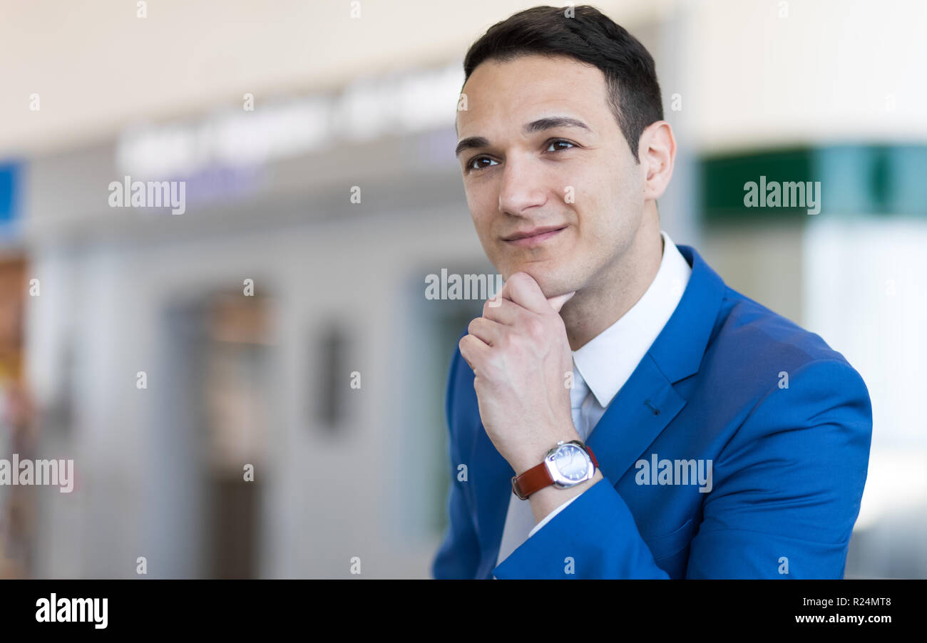 Successful young businessman inside modern hi-res stock photography and ...