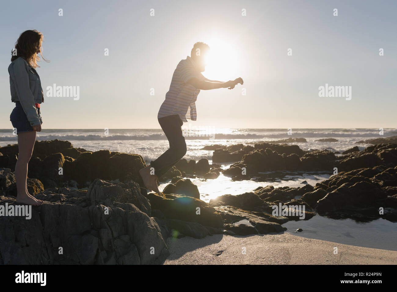Young couple having fun beach hi-res stock photography and images - Alamy