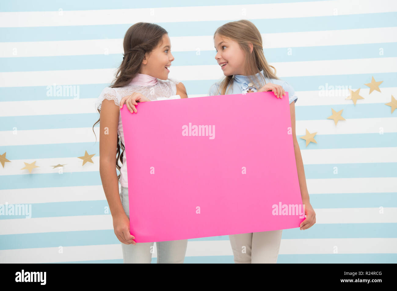 Girl hold announcement banner. Girls kids holding paper banner for ...