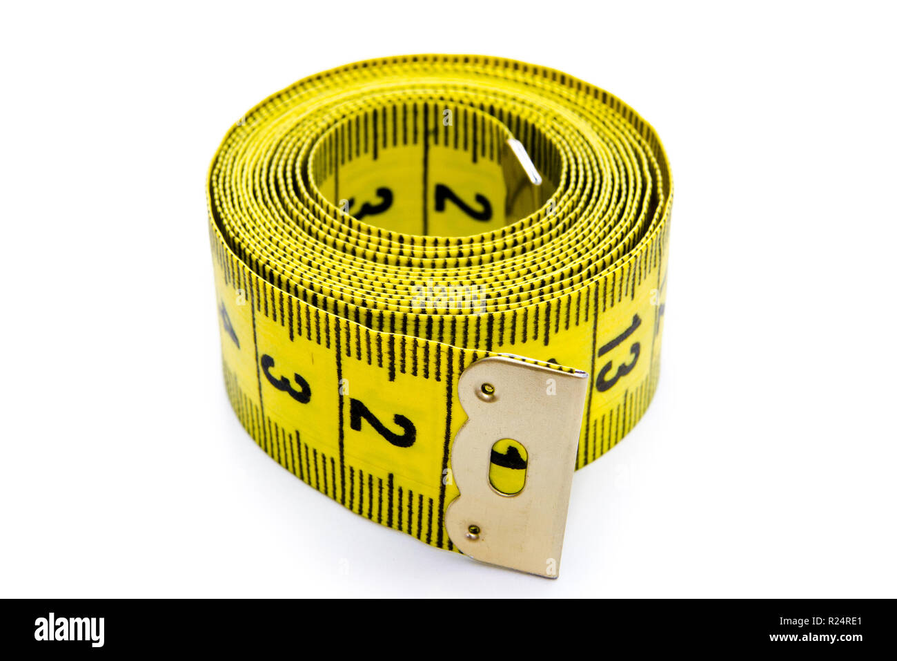 yellow centimeter isolated on a white background Stock Photo - Alamy