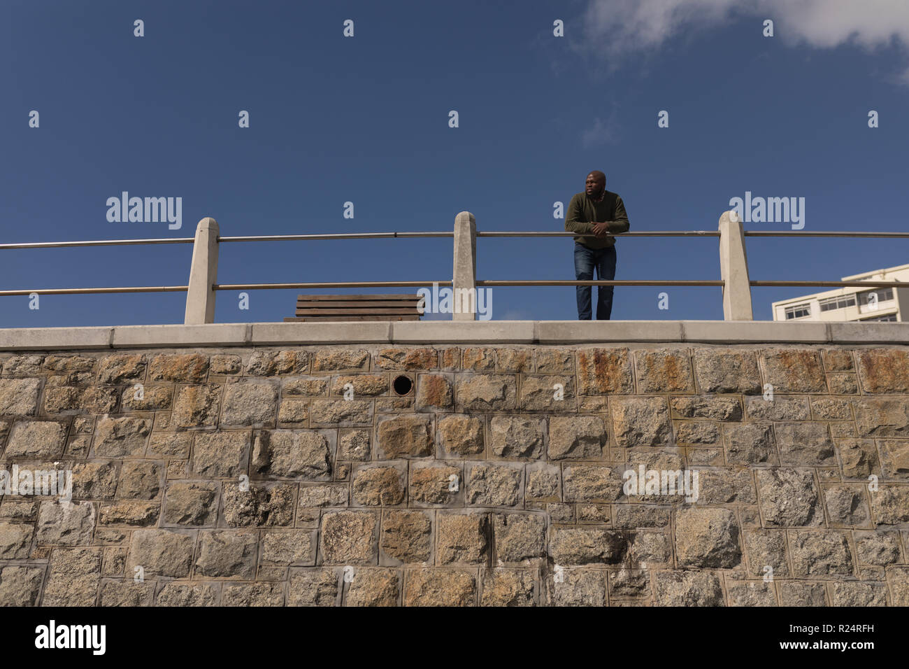 Man leaning on railing hi-res stock photography and images - Alamy