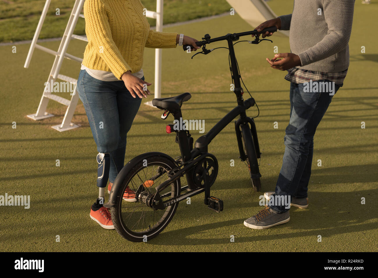 Holding cycle hi-res stock photography and images - Alamy