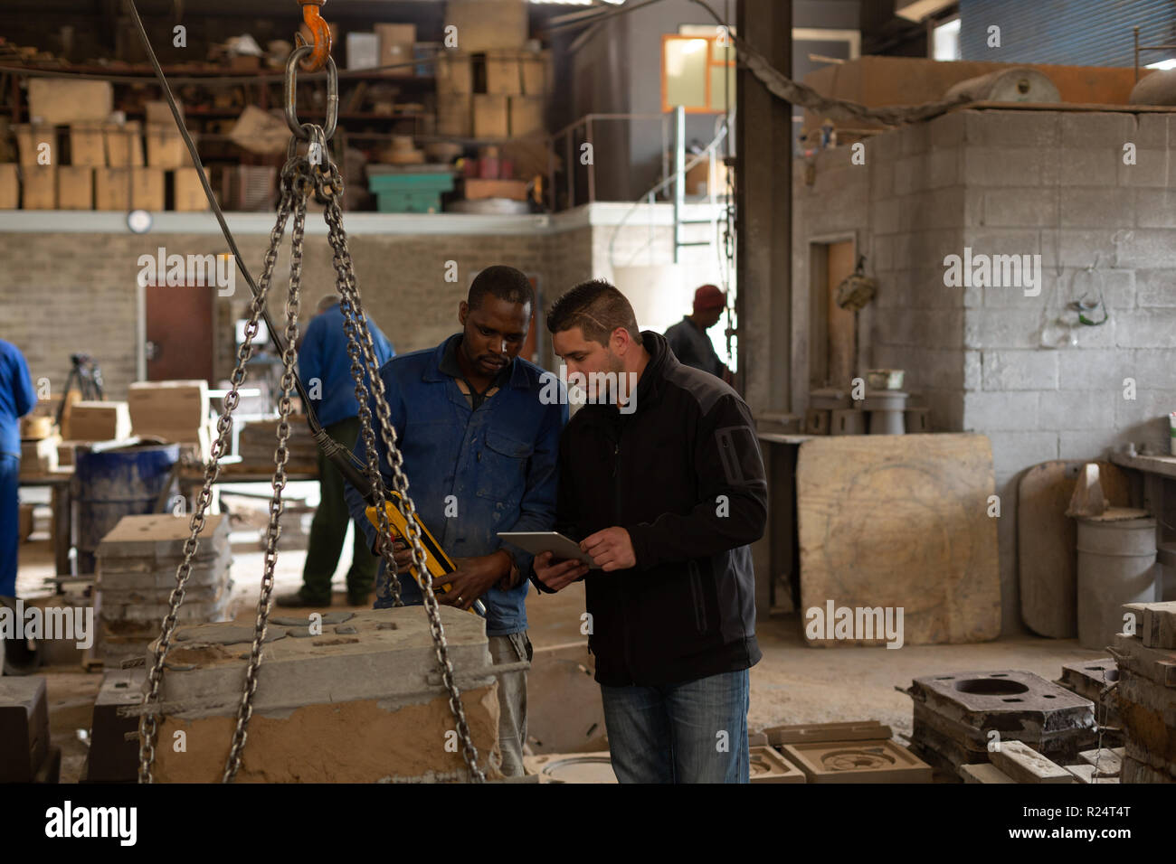 Professional workers in workshop hi-res stock photography and images ...